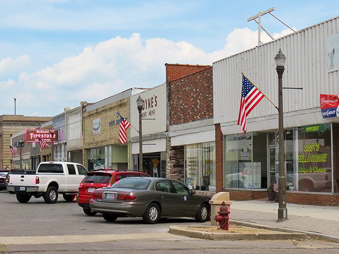 This classic main street, lined with old shops and waving American flags, feels like a warm embrace of local life.