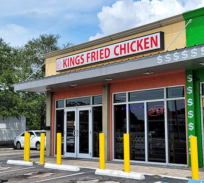 That bright red sign isn't just advertising - it's practically shouting "best chicken in St. Pete!"
