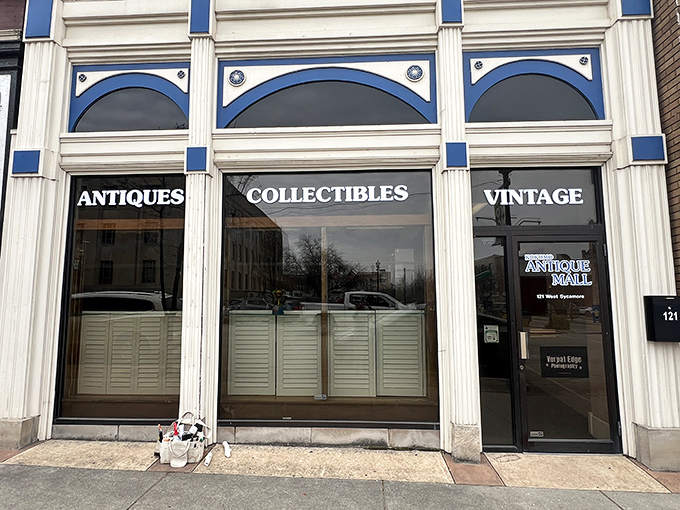 The classic storefront of Kokomo Antique Mall beckons with its blue trim and promise of treasures waiting just beyond those vintage doors.
