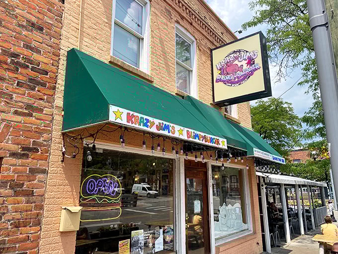 That cheerful green awning beckons like a siren call to burger lovers everywhere.