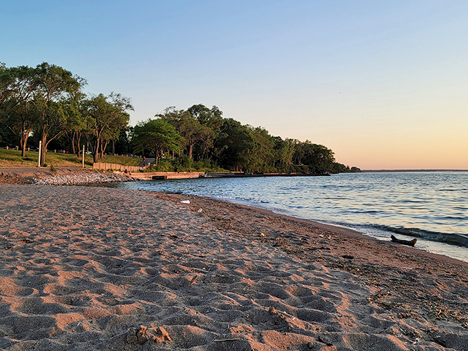 Golden hour magic transforms this Lake Erie shoreline into something straight from a postcard dream.
