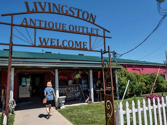 The rusty welcome sign at Livingston Antique Outlet promises treasures inside &ndash; like a time portal disguised as a country store.