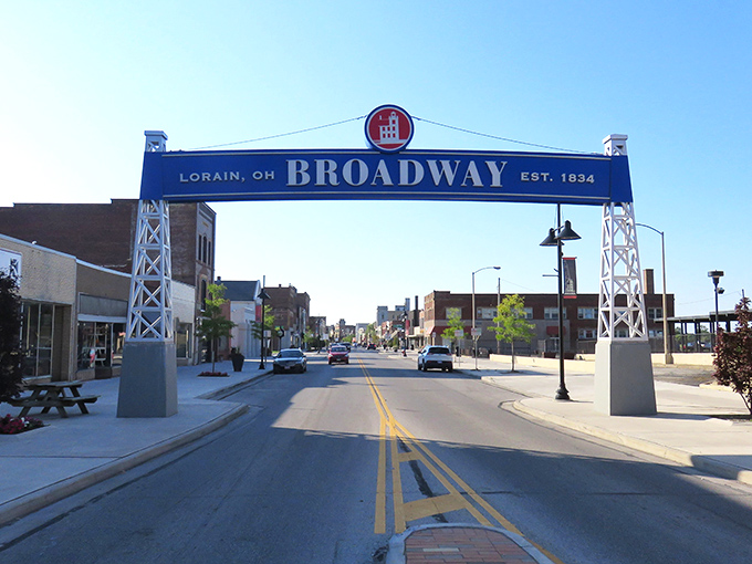 Lorain's Broadway arch stands like a welcoming gateway to affordability. Blue skies and small-town charm await on the other side.