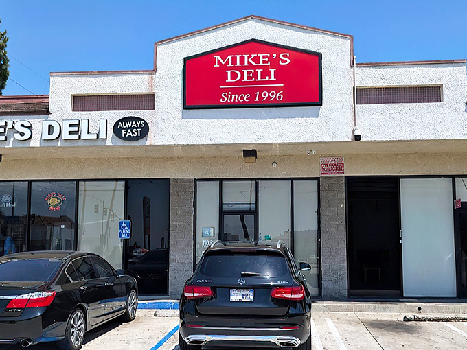 Sometimes the best treasures hide behind the most unassuming facades - Mike's red sign promises greatness.