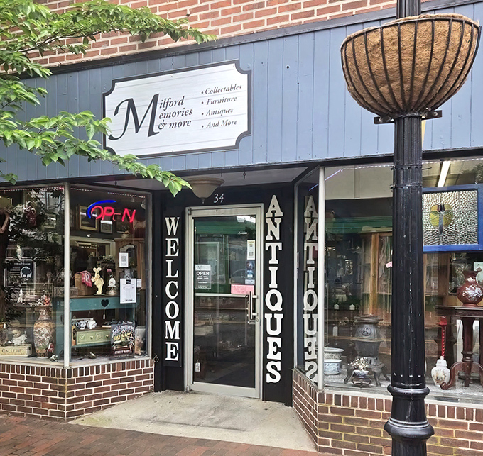 The blue storefront of Milford Memories beckons like an old friend. "Welcome Antiques" isn't just a sign&mdash;it's a promise of treasures waiting inside.