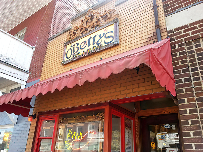 That red awning beckons like a beacon for hot dog lovers seeking authentic comfort food treasures.