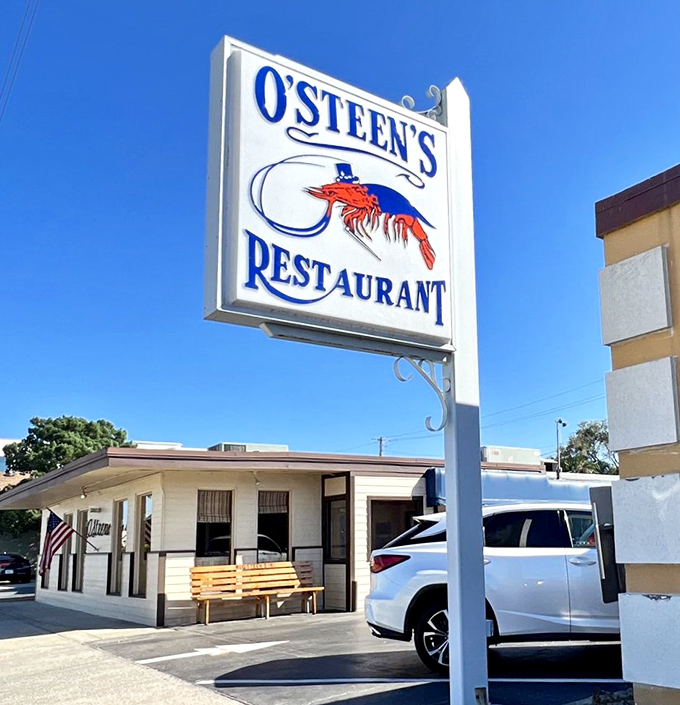 That classic shrimp sign promises golden treasures inside - O'Steen's knows how to hook you from the street.