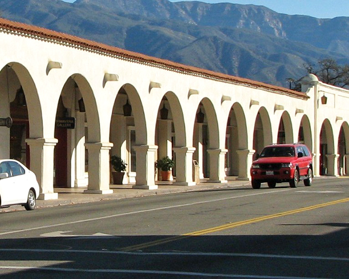 Spanish colonial arches frame mountain views like a postcard from heaven itself.