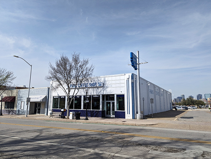 The iconic white exterior of Paris Coffee Shop stands like a time capsule in Fort Worth. Simple outside, magic inside!