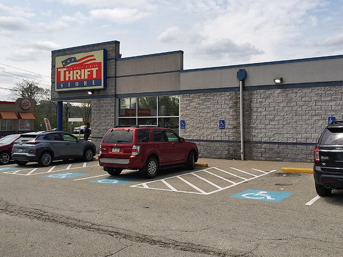 The Red White & Blue Thrift Store's iconic sign beckons bargain hunters like a lighthouse for the budget-conscious shopper.