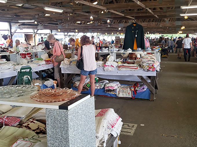 Under these weathered wooden beams, treasure hunters discover everything from vintage linens to mysterious kitchen gadgets your grandmother swore by.