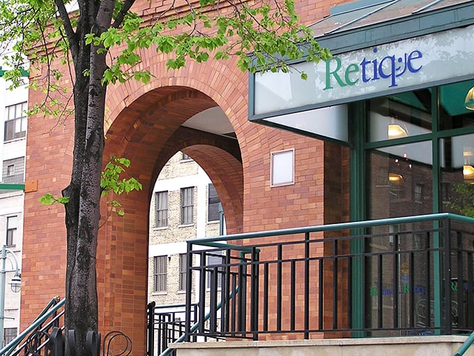 Retique's brick archway entrance isn't just inviting&mdash;it's practically whispering, "Come find treasures that won't require a second mortgage!"