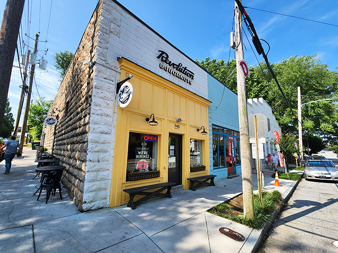 Revolution Doughnuts' cheerful yellow storefront is like sunshine in building form. The perfect backdrop for the sweet treasures waiting inside!