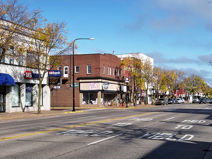 Classic Main Street charm meets autumn's golden touch in this quintessential Wisconsin downtown scene.