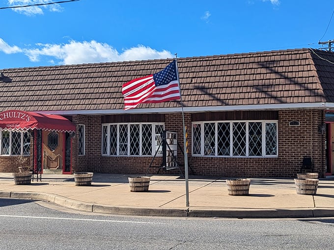 That red awning beckons like a lighthouse for crab lovers - Schultz's has been Essex's seafood beacon for decades.