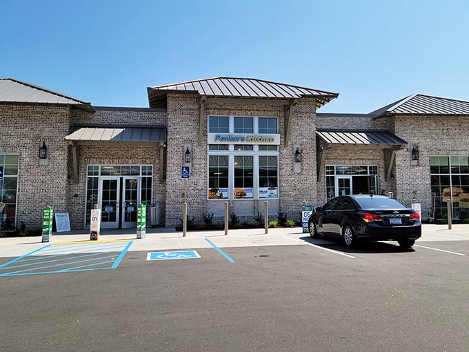 Modern brick facade welcomes bargain hunters to this coastal shopping paradise where deals bloom year-round.