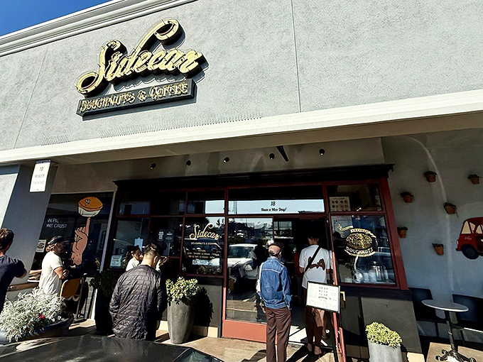 That golden Sidecar sign promises sweet adventures ahead - like a beacon for donut devotees everywhere.