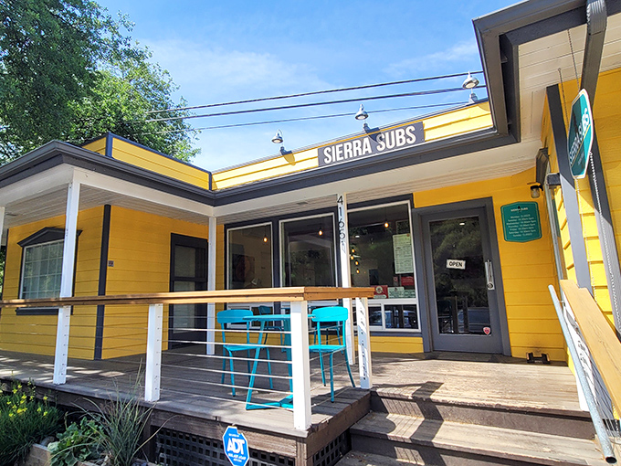 The sunshine-yellow exterior of Sierra Subs practically screams "Happiness served between bread!" Those turquoise chairs are calling your name.