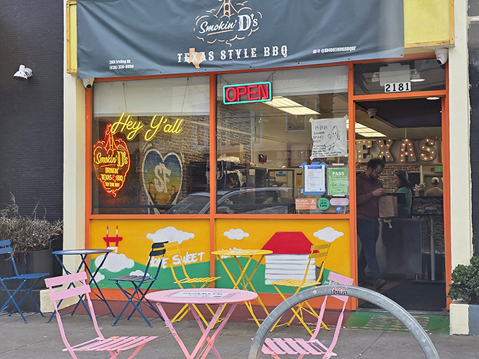 That colorful storefront practically shouts "Hey y'all, come get some serious BBQ!" - and who could resist?