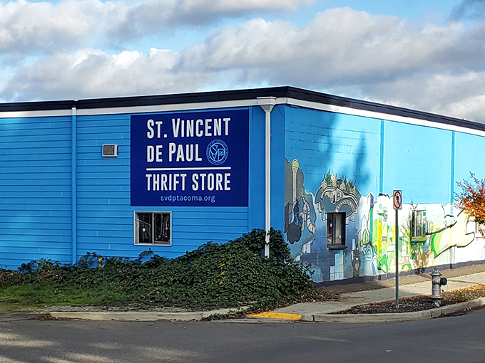 The blue beacon of bargains! St. Vincent de Paul's vibrant exterior promises treasures inside that'll make your wallet do a happy dance.