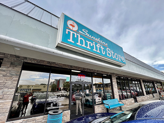 That cheerful turquoise sign promises treasure hunting adventures that would make any bargain hunter's heart skip a beat.