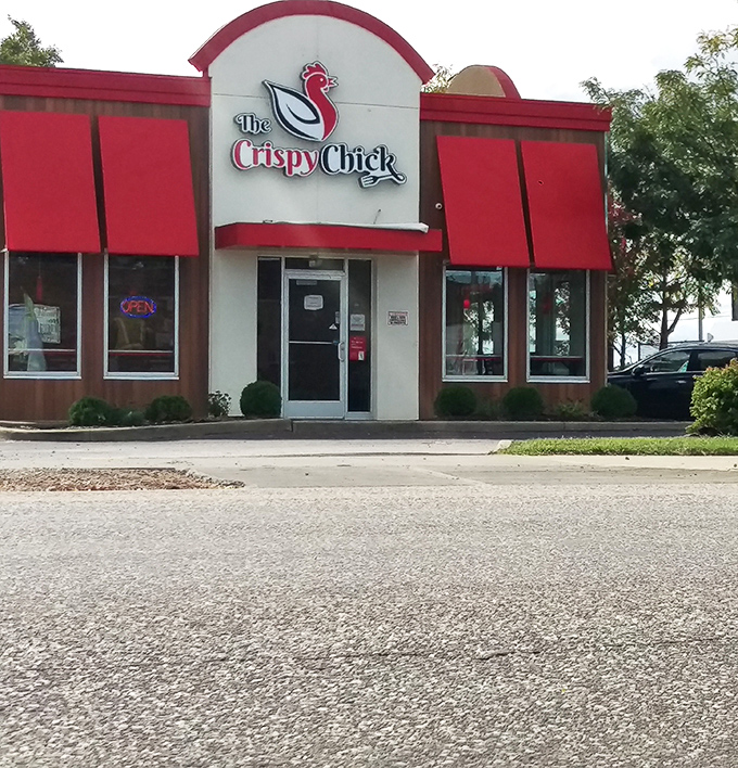 That red and white storefront isn't just pretty &ndash; it's your beacon to crispy chicken paradise.