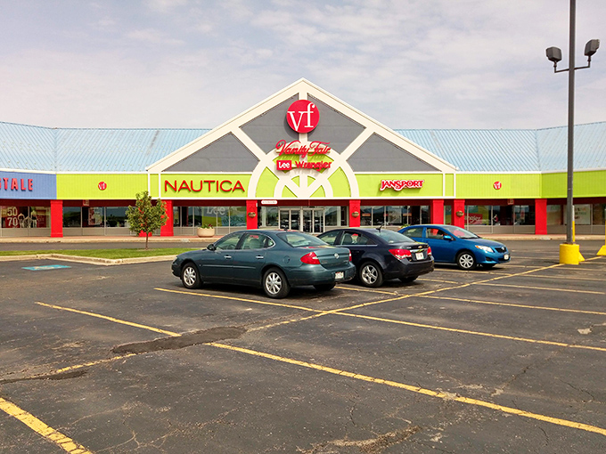 The Outlet Shoppes at Oshkosh beckons with colorful storefronts that promise retail therapy without the guilt.