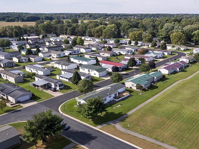 Aerial views reveal the secret: well-planned communities where neighbors become family and budgets breathe easy.