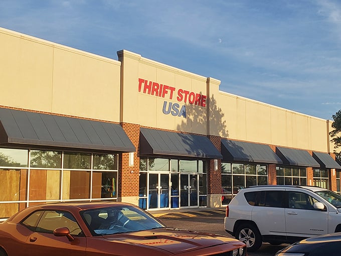 The beige facade of Thrift Store USA beckons like a siren call to bargain hunters. Inside those doors, treasures await discovery!