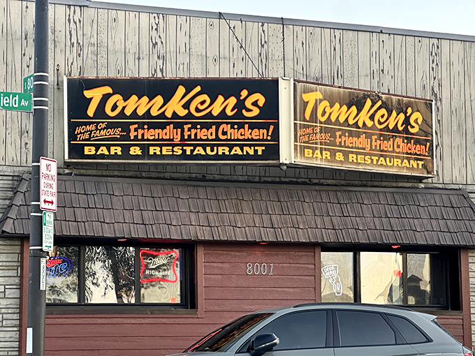 That weathered wood exterior holds secrets worth discovering - TomKen's knows fried chicken like Sinatra knew swing.