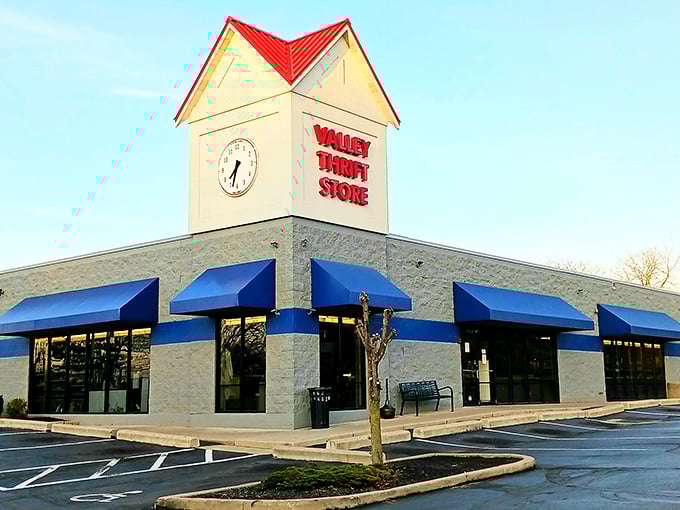 Valley Thrift Store stands proud with its clock tower and blue awnings - a landmark for treasure hunters seeking retail therapy without the full price tag.