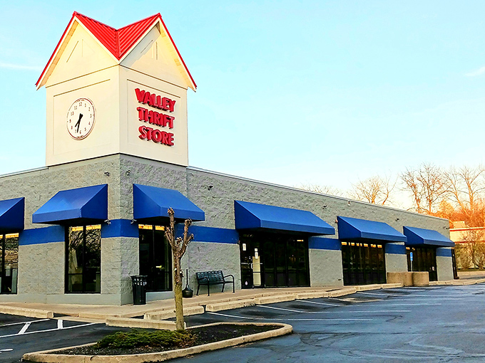 Valley Thrift Store's iconic clock tower stands like a time machine to bargain paradise, beckoning shoppers with its red-topped charm.