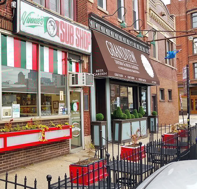 The classic red, white, and green awning of Vinnie's Sub Shop &ndash; a Chicago institution where sandwich dreams come true.