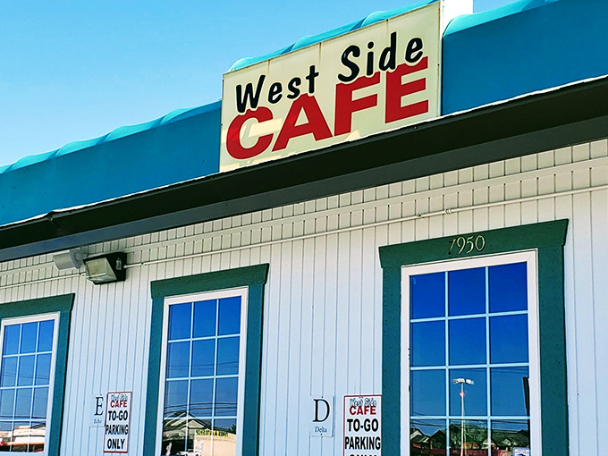 The iconic West Side Cafe sign promises "Country Cookin'" that'll make your taste buds do the Texas two-step.