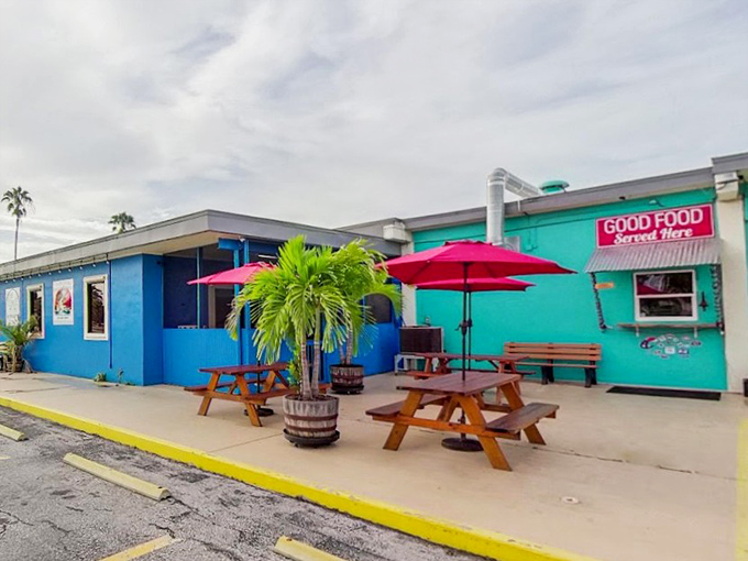 That turquoise and blue exterior isn't just eye-catching – it's your first hint that adventure awaits inside.