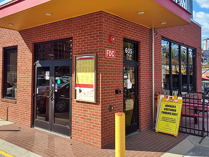 Arnold's corner entrance beckons hungry Nashvillians like a southern siren song. That yellow "Customer Parking Only" sign might as well say "Happiness This Way."