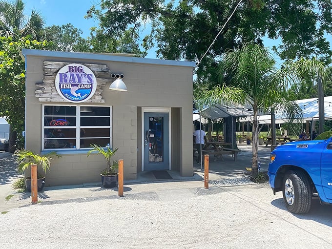 That bright green door isn't just an entrance &ndash; it's a portal to grouper sandwich nirvana that locals guard like a secret fishing spot.