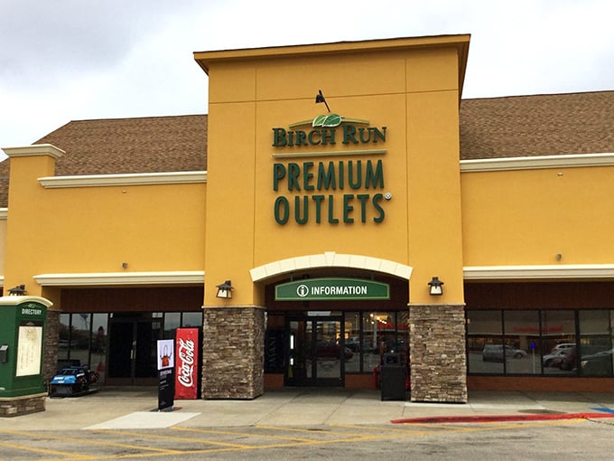 Stone accents and sunny walls create an inviting entrance that promises serious shopping adventures ahead.