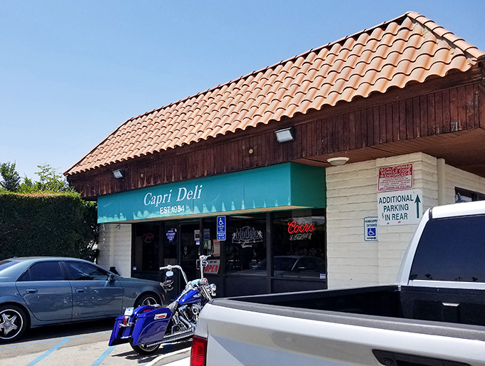That classic red tile roof whispers "authentic Italian" louder than any neon sign ever could.