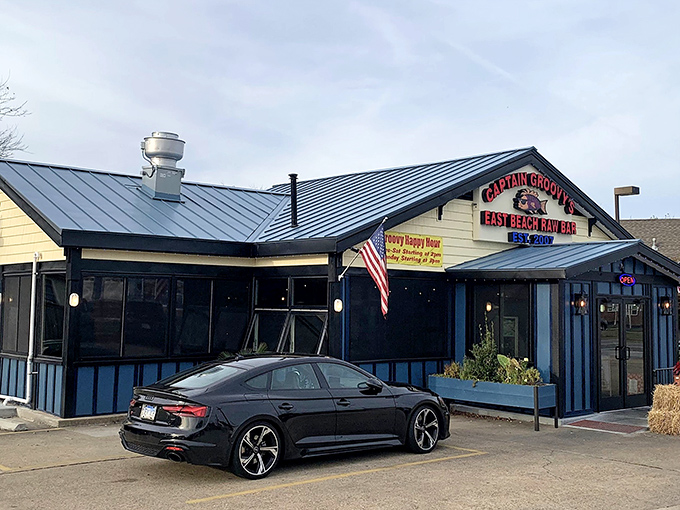 The American flag flutters proudly outside this unassuming seafood haven, where "Groovy Happy Hour" isn't just a sign&mdash;it's a way of life.