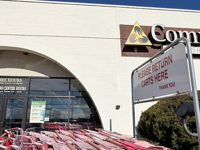 Shopping carts lined up like eager racehorses, ready to be filled with thrifty finds at Community Aid.