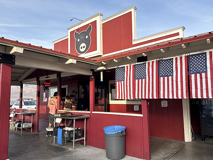 When your BBQ joint looks like a rustic barn with patriotic flair, you know the brisket means business inside.