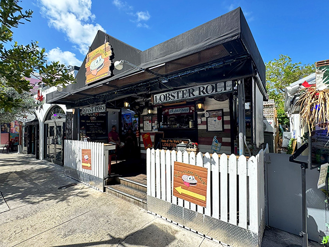 That "Lobster Roll" sign is like a beacon of deliciousness, promising seafood heaven in the heart of Key West.