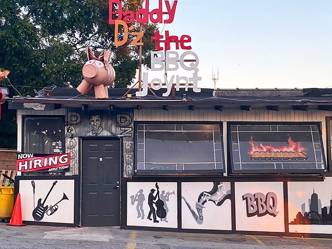 Like finding a hidden treasure chest, this vibrant spot promises ribs that'll make you forget fancy restaurants exist.