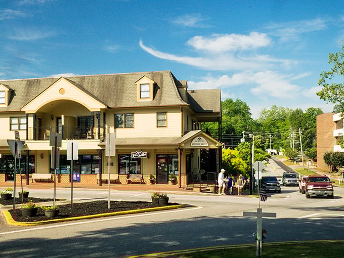 Small-town storefronts line peaceful streets where neighbors wave and nobody's rushing to get anywhere fast.