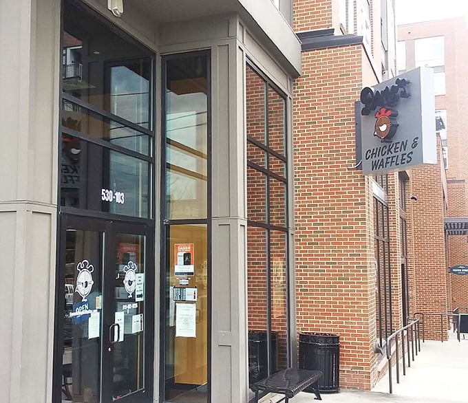 Floor-to-ceiling windows invite you inside where chicken and waffles create perfect harmony together.