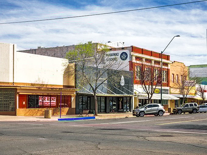 Masonic mysteries and bargain hunting collide on Douglas's main drag, where "FOR RENT" signs promise affordable business dreams in classic southwestern style.