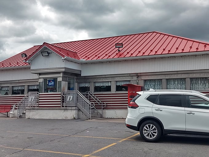 The quintessential roadside diner beckons with its gleaming metal exterior. Even the ATM looks nostalgic here.