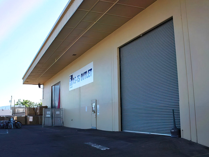 Behind these warehouse doors lies the ultimate thrift adventure where everything sells by the pound.