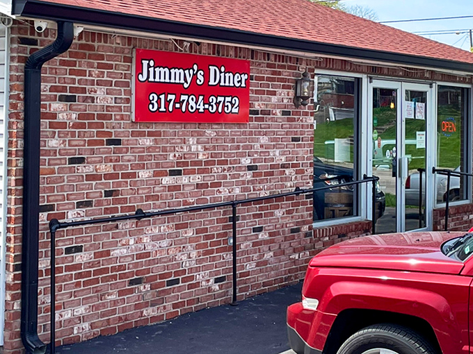 Jimmy's red sign beckons like a lighthouse for hungry souls seeking authentic diner comfort.